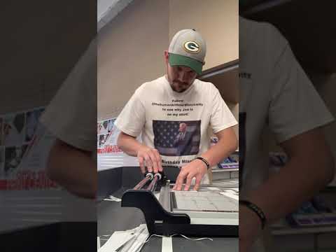 Using Office Max's Paper Cutter With Joe Biden