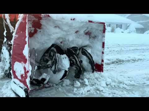 RAW VIDEO: Residents clear heavy snowfall in Erie, Pennsylvania
