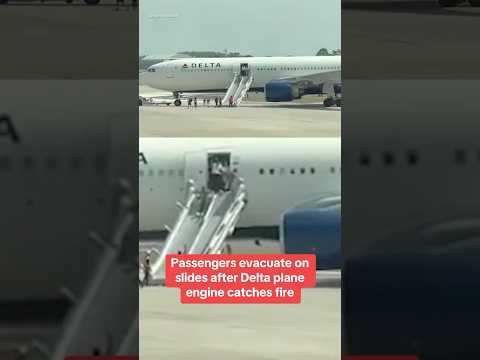 Passengers evacuate on slides after Delta plane catches fire #shorts