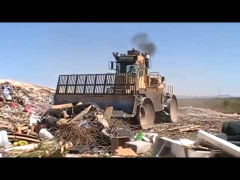 Caterpillar 836 Compactor And A D8T Dozer At the Republic Landfill In Apache Junction, Arizona
