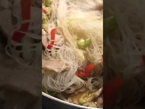 Filipino Pancit Bihon! Rice noodle,pork or chicken meat,garlic,onions red & green bell pepper etc.