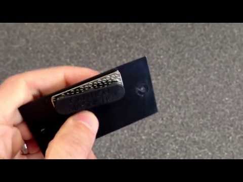 Review of 3" x 1.5" name tag with black holder and magnet for attachment.
