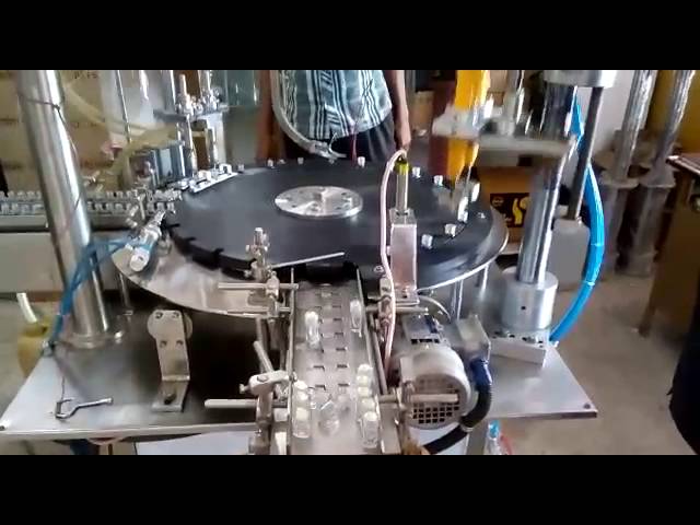 Capper Machine For Bottle - Automatic Eight Head Bottle Plugging Machine Manufacturer from Ahmedabad