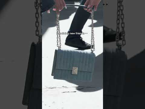 The Denim Deco Chain Shoulder Bag is in good hands—but whose? Coming soon. 👀 #katespadeny