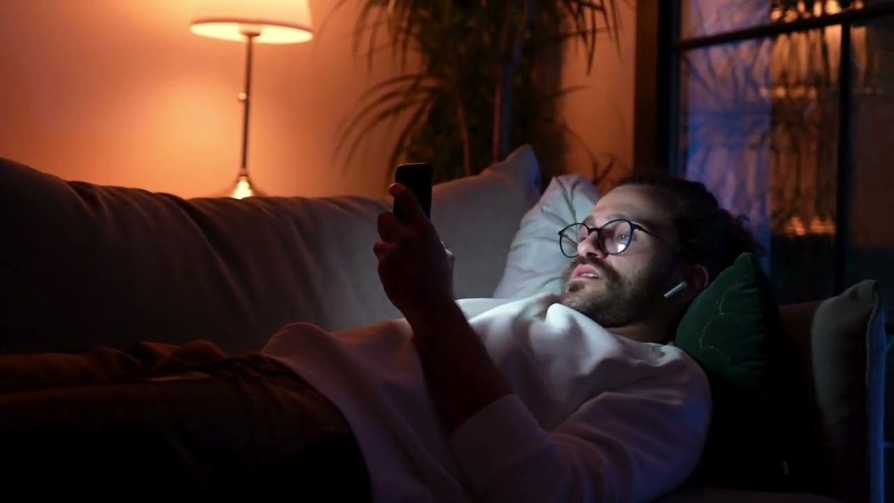 Man using mobile phone, Lying, Tired, Upset, Frustrated,  | Free Stock Footage