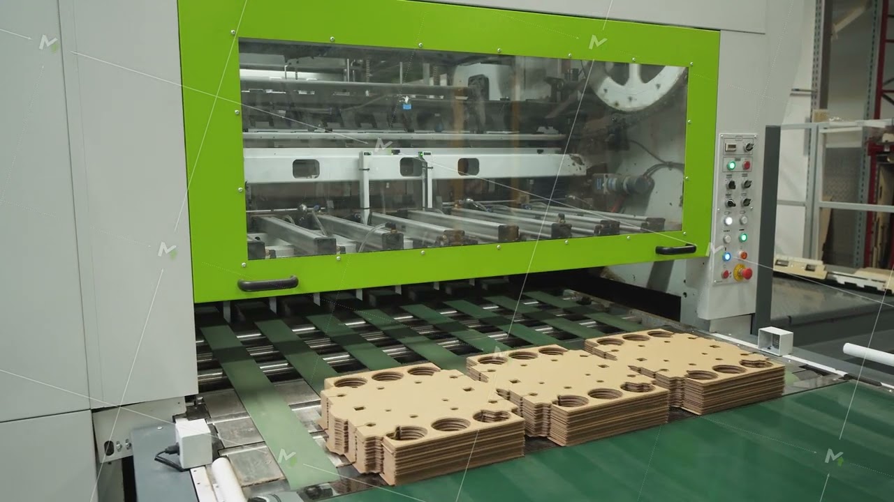 Reuse paper. Automatic line for production of brown cardboard boxes. Conveyor line for production of