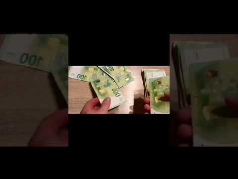 counting 100€ of real stack euro nicely