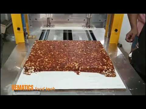 Chikki Making Machine - Mysore Pak Cutting Machine Manufacturer from Mumbai