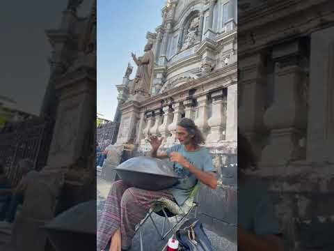 Man playing his intrument front of the church#short#video