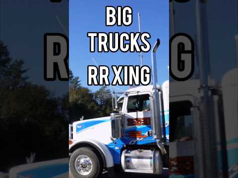 BIG TRUCKS AT RR CROSSING, Curt's Towing