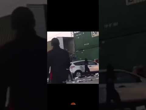 Shocking in name of George floyd looters are stealing Tv's from a moving train in broad daylight