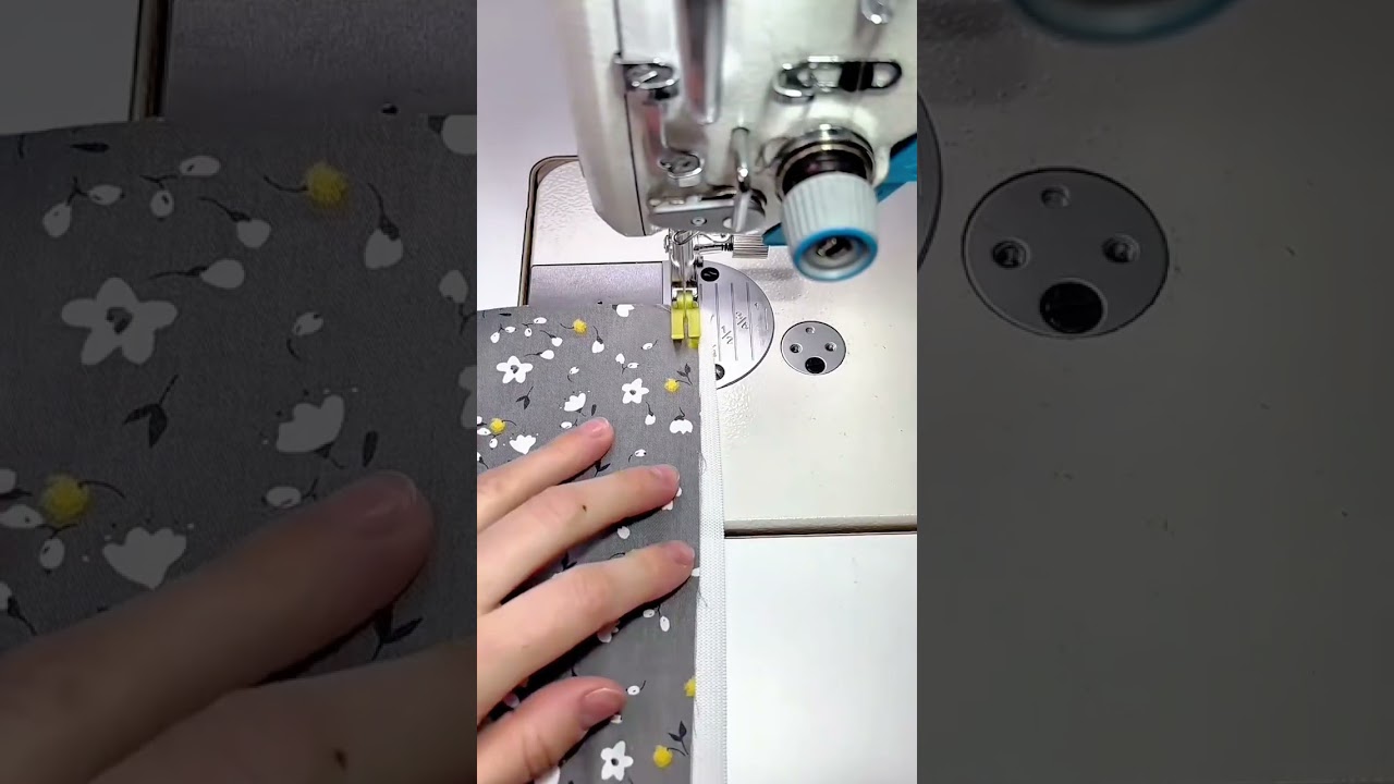 sewing a floral pattern fabric using a professional automatic machine to create high quality garment