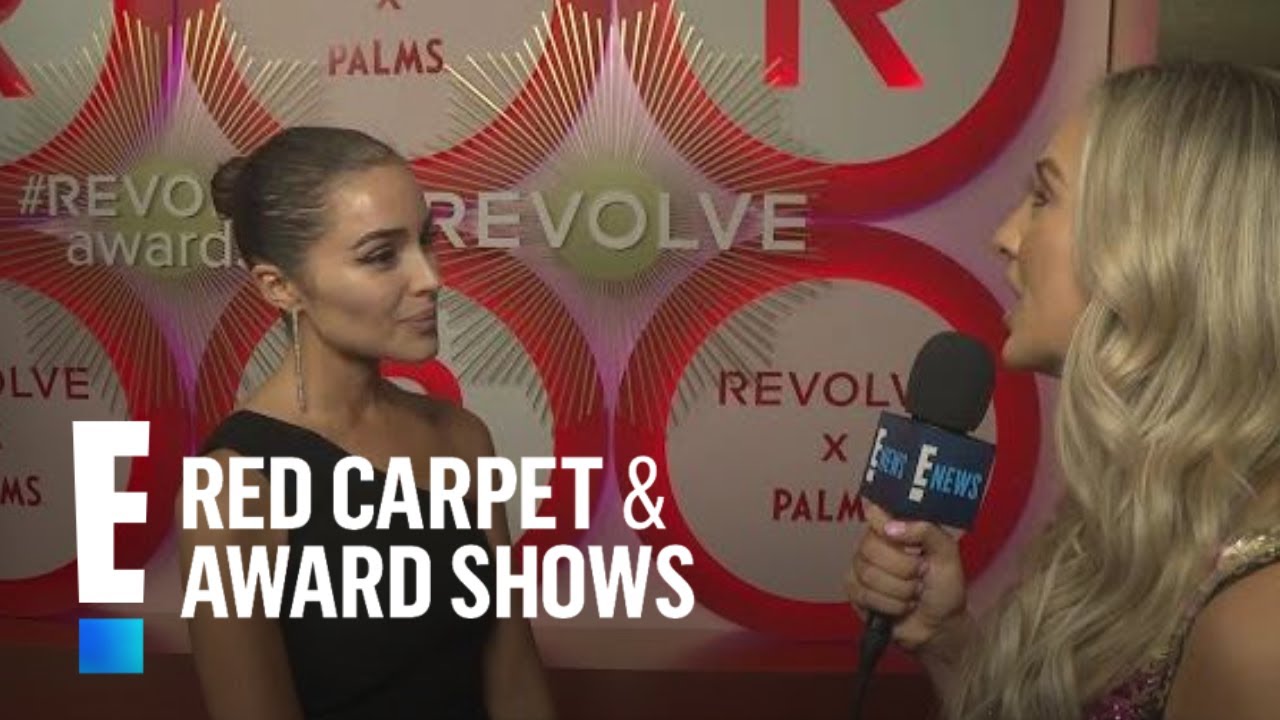 Olivia Culpo Spills on Striking Poses With a Large Snake for 