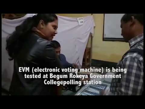 EVM (electronic voting machine) is being tested at Begum Rokeya Government College polling station