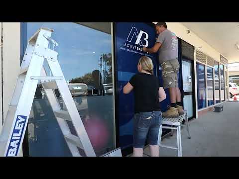 Installing window signs - Self adhesive vinyl. Designed and installed by @artworkn