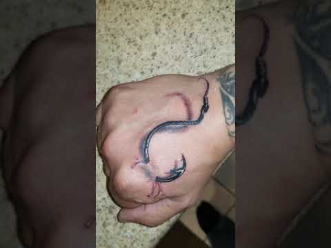 New Fish Hook Tattoo from evolution Tattoo BHC AZ