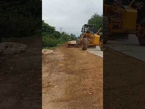 #prepare shoulder for concrete Pavement #construction #road #caterpillar #road #heavymachinery