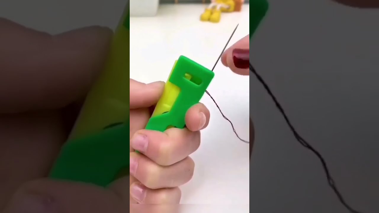 Automatic needle Threader.