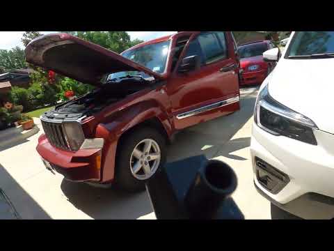 How to fix code P0302 on a 09 Jeep Liberty | Coil Replacement