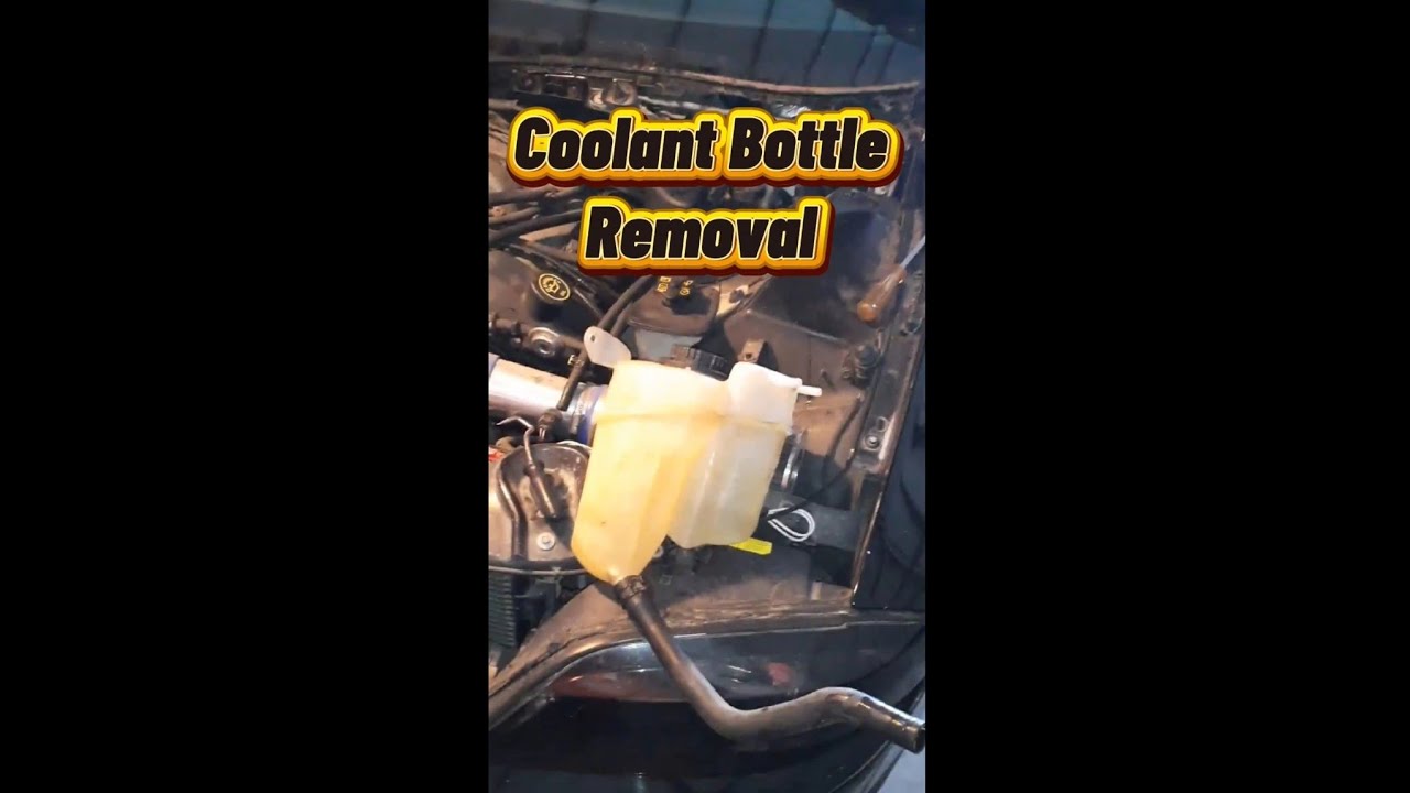 Lincoln LS Coolant Bottle Removal Process.
