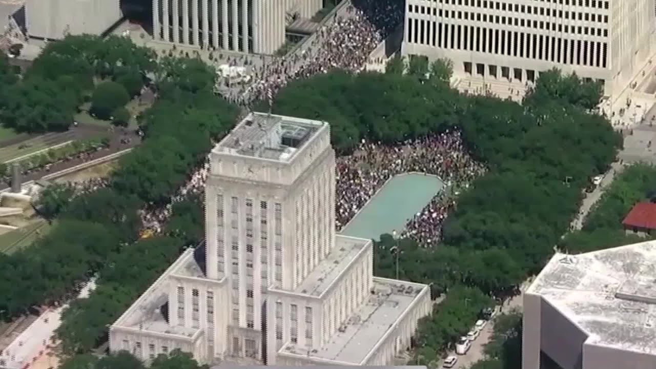 Police officer hugs crying 5-year-old girl at protest