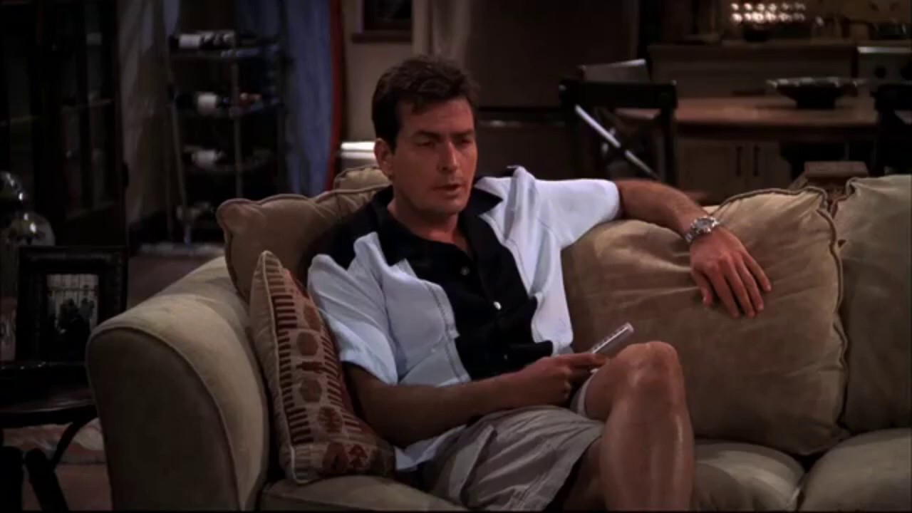 Two and a Half Men - Charlie and Jake are watching TV