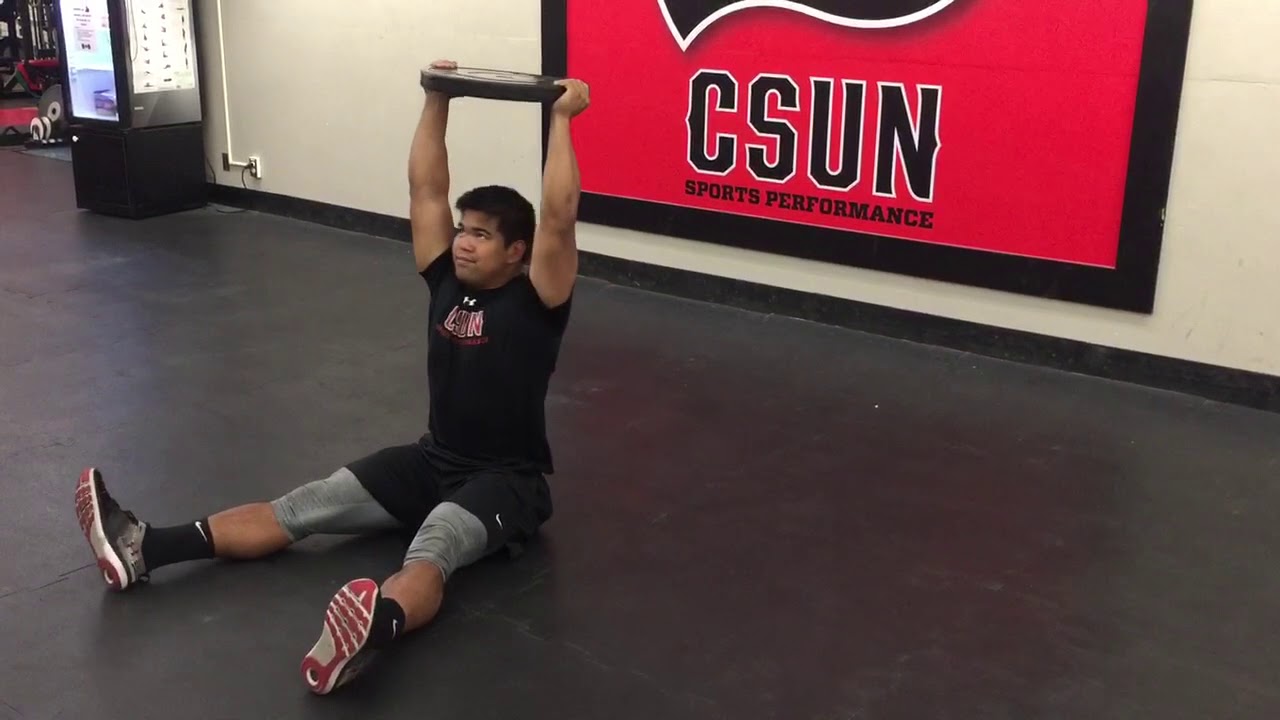 OH (Overhead) Plate Sit-up