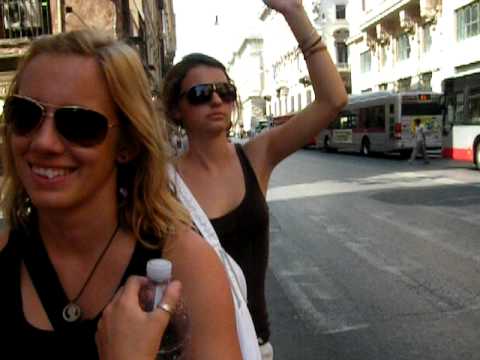 Ann trying to call for a Taxi in Florence.