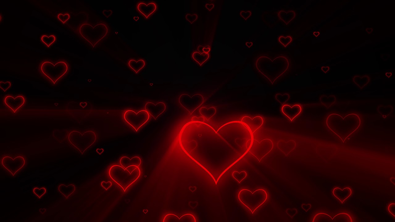 Fondo De Rayos De Luz con Corazones Rojos De San Valentín  Loop  HD