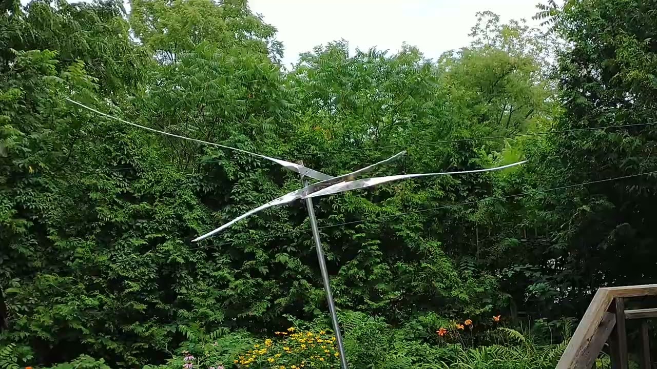 Three element kinetic sculpture responds to a moderate wind