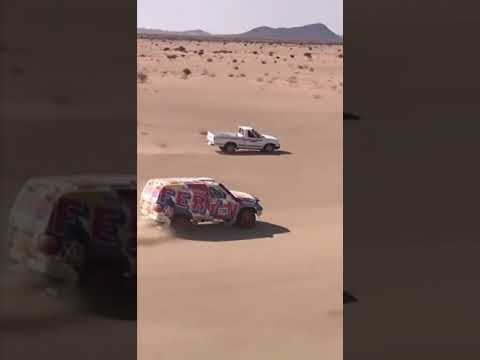 Dakar Rally in Saudi Arabia: Two young men driving a Nissan truck ahead of the Belgian team