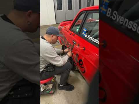 Fixing stickers on a rally car 🚗 #shorts #sticker #stickers #decals #rally #rallycar #volvo