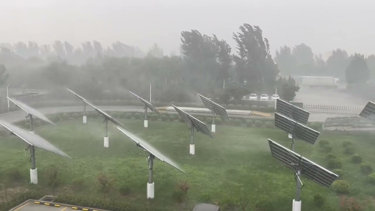 Dual axis solar tracker in rainstorm