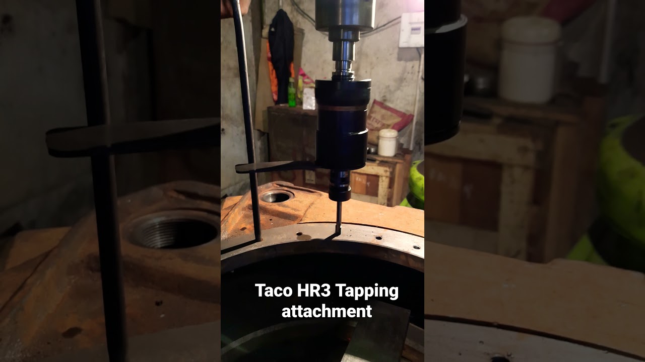 Auto reversable tapping attachment.