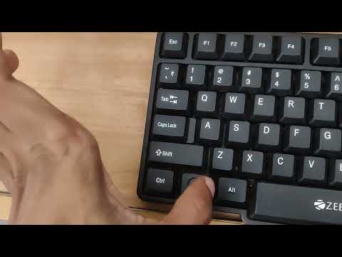 How to type Downwards arrow with tip Rightwards Symbol in Computer