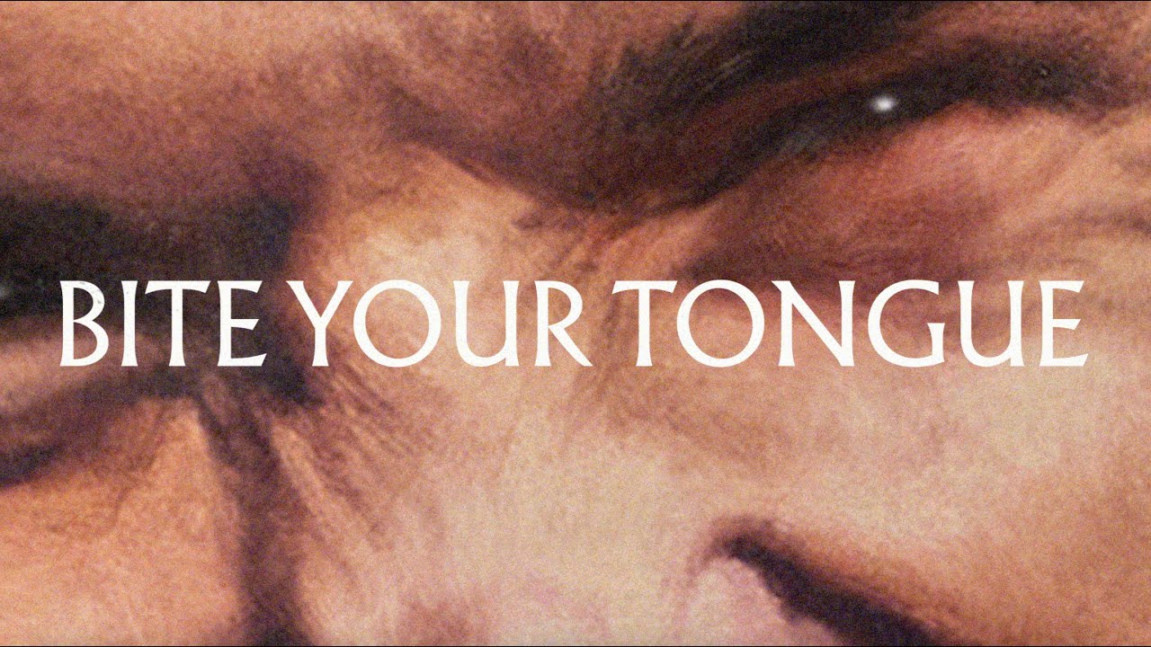 Robbie Williams - Bite Your Tongue (Official Lyric Video)