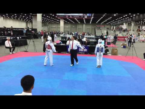 Maya winning Gold in sparring at the 2017 TKD Nationals