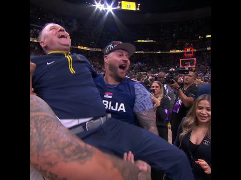Nikola Jokic's brothers toss Michael Malone after Nuggets win the 2023 NBA Finals 🏆