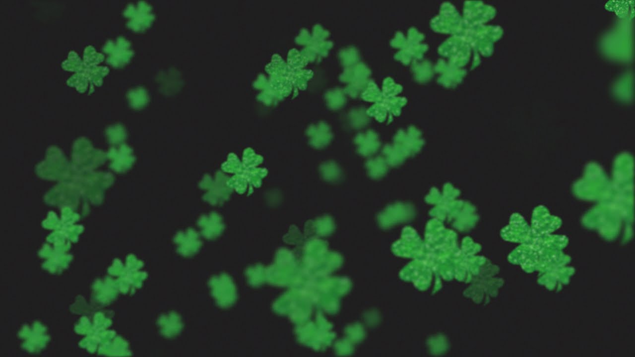 4 Leaf Clover Glow Background.  Four Leaf Clover Animation. St Patrick's Day.