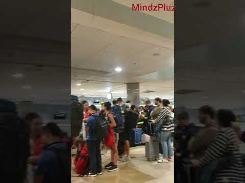Crazy long queue at Ryanair counter at Adolfo Barajas Madrid airport, Spain