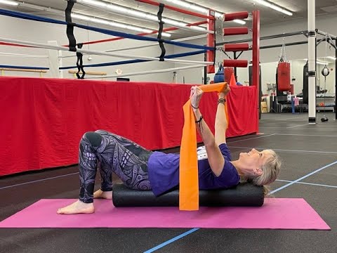 Parkinson's Disease: Correct Stooped Posture by Adding a Band to Opening the Newspaper