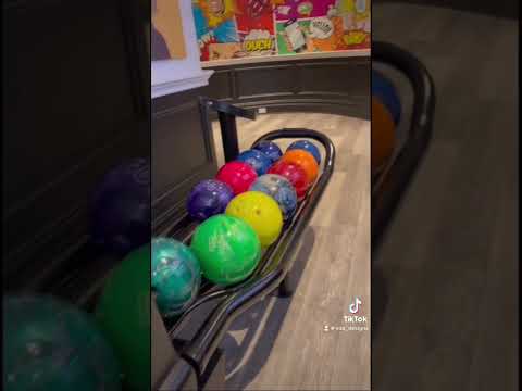 Before & after basement bowling alley designed by VDA