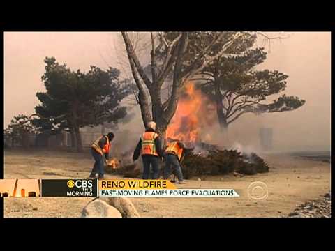 Reno wildfires force thousands to evacuate
