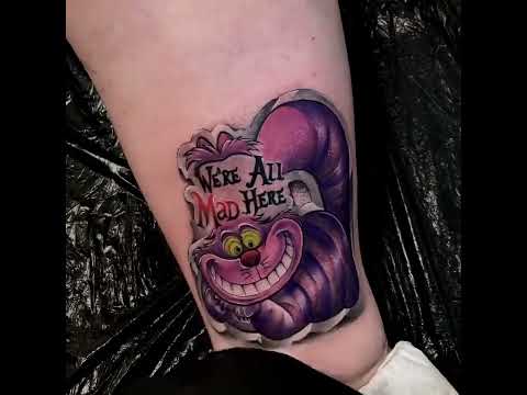 Timebomb Tattoo Croydon: disney cheshire cat tattoo
