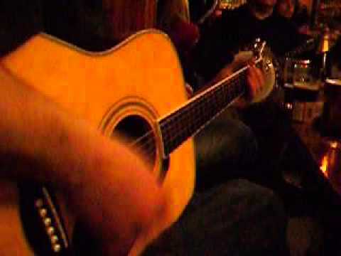 Irish traditional music session doolin o'cornars pub 050227guiter3