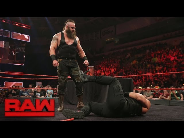 WWE Video: Security guard gets caught in Roman Reigns' spear to Braun ...