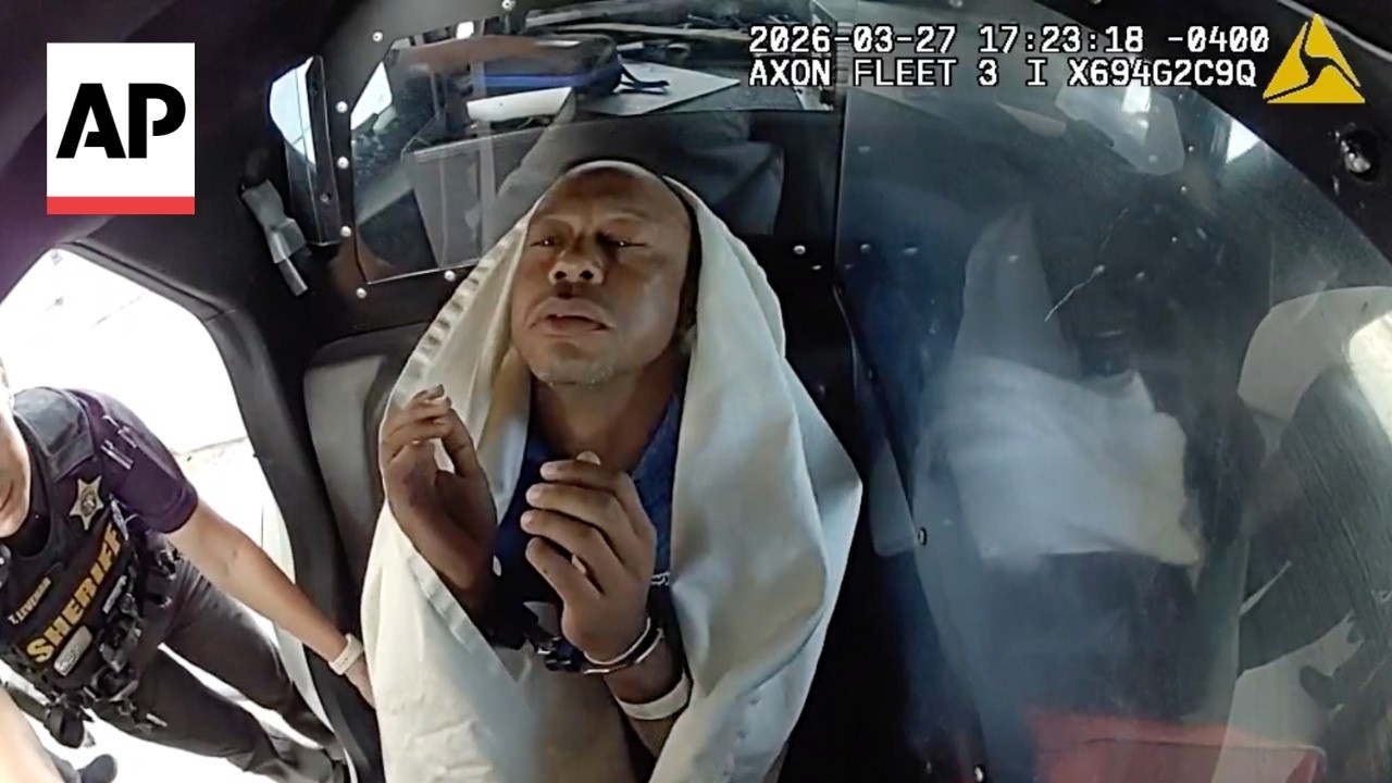 Bodycam video shows Tiger Woods appearing to nod off in back of police car