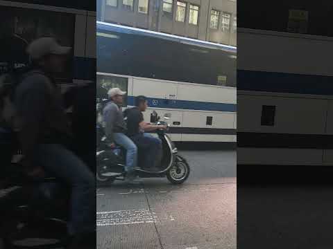 Prevost #2606 on the SIM1C Passing 6th Avenue and 37th Street
