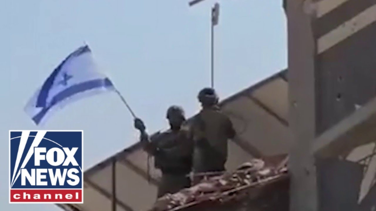 IDF seen raising Israeli flag inside Gaza
