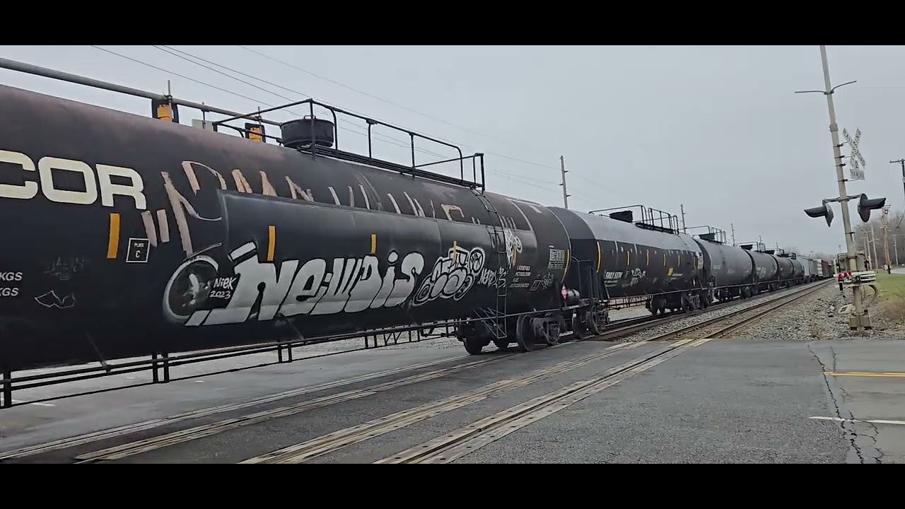 11:55 Csx M561 with Csx-3151/FXE-4646/Gecx-4433/4460/Csx-3111 west at pixley road Milepost 376.43